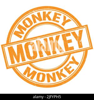 MONKEY text written on orange trapeze stamp sign Stock Photo - Alamy