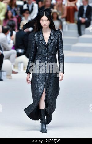 Model He Cong walks on the runway at the Coperni fashion show during ...