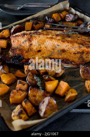 Oven roasted half salmon fillet with oilive oil, thyme, garlic and ...