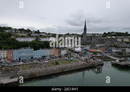 Popular as a tourist destination Cobh harbour with brightly coloured ...