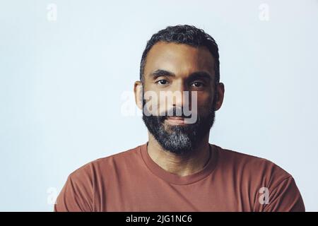 headshot portrait of a handsome thoughtful bearded mid adult man ...