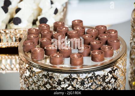 Party decorations; Candy table, table with various sweets and cakes ...