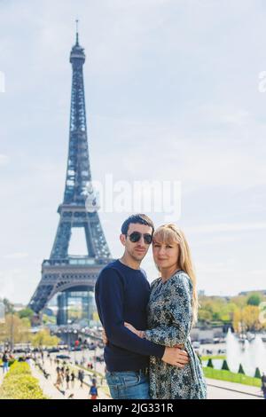 Woman near the eiffel tower. Selective focus. People Stock Photo - Alamy