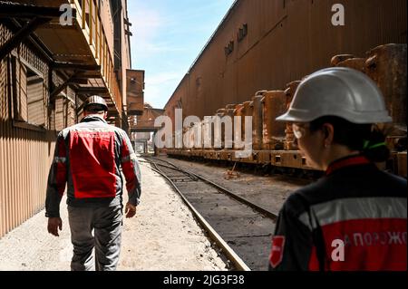 ZAPORIZHZHIA, UKRAINE - JUNE 28, 2022 - A teeming aisle of an open ...