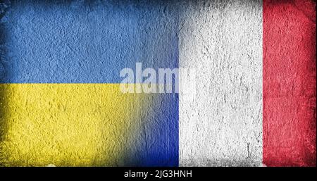 Ukrainian and French flag on concrete, divided in the middle Stock ...