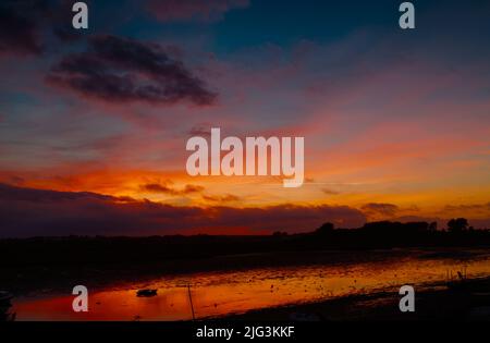 Sunset Over Stanpit Marsh Nature Reserve And Christchurch Town, uk ...