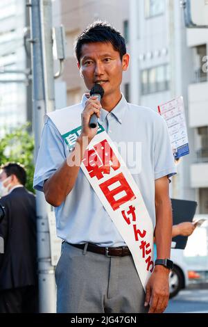 Kentaro Asahi delivers a street speech outside Tokyo Dome on July 7 ...