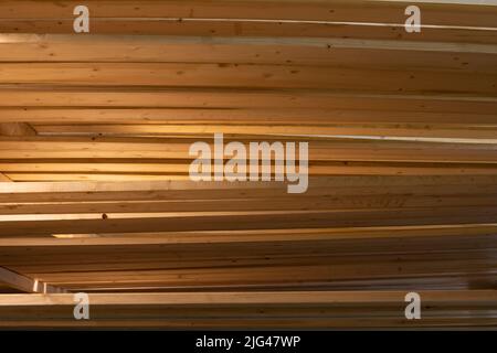 Boards in stock. Building material. Long boards in carpentry workshop ...