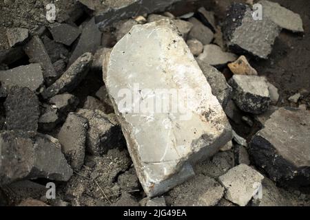 Broken concrete slabs. Lots of stones. Construction waste. Details of ...