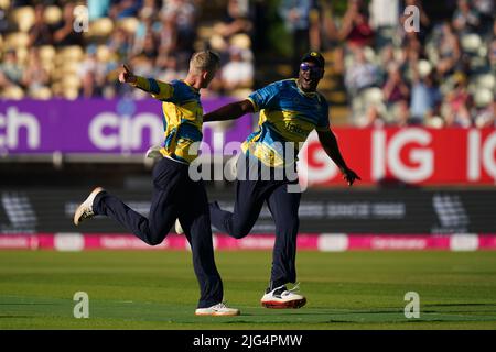 Dan Mousley of Birmingham Bears celebrates bowling Jafer Chohan of ...