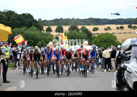 The peloton ride through the French countryside during stage 12 of the ...