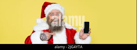 cheerful plus size man with mobile phone and wireless earphones ...