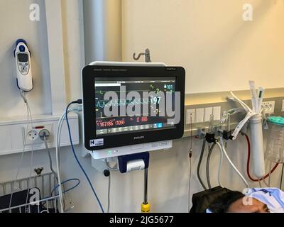 Hospital electrocardiogram, critical care and icu patient with doctor ...
