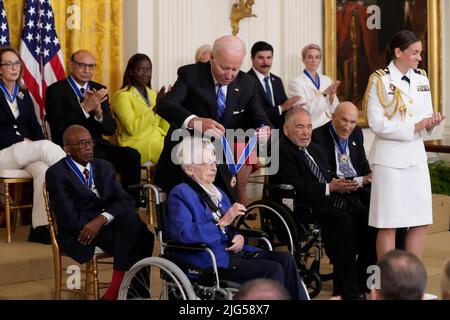 Brigadier General Wilma Vaught accepts the Medal of Freedom from United ...