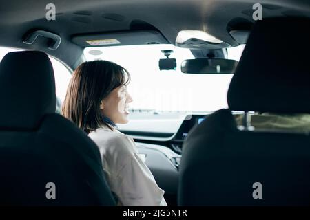 Japanese couple having a drive together Stock Photo - Alamy
