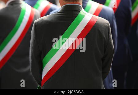 Many italian mayors with tricolor green white and red band during ...