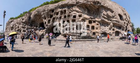 Panorama view of the carved statues of Longmen Grottoes (Longmen Caves ...