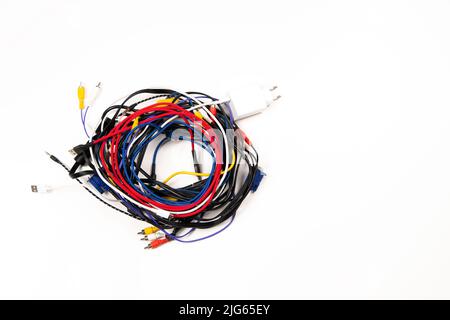 Pile of coiled computer cables on white background Stock Photo - Alamy