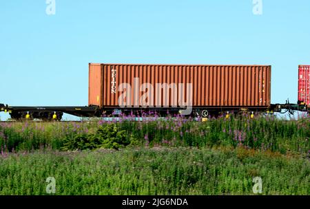 Triton shipping container on a freightliner train, Warwickshire, UK ...
