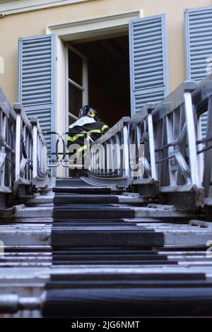 The firefighters' extendable ladder called a ladder truck in extension ...