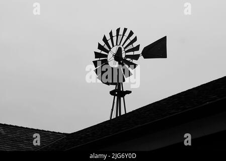 Iconic American wind mill set against the sky Stock Photo - Alamy