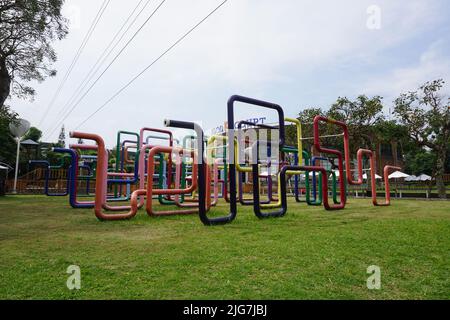 A colorful pipes on playground over the blue sky. Commonly known as Talk Tubes, have valuable ...