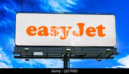 Advertisement billboard displaying logo of EasyJet Stock Photo - Alamy