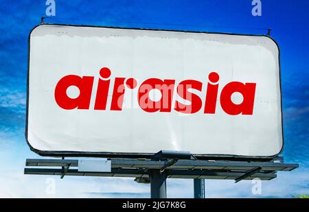 Advertisement billboard displaying logo of AirAsia Stock Photo - Alamy