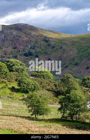The view from Eskdale Green of Brantrake Crags And Fells on a summers ...