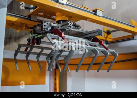Lifting jaw grip of bag stacking machine Stock Photo - Alamy