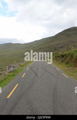Narrow, winding road on Valentia Island, County Kerry, Ireland Stock ...