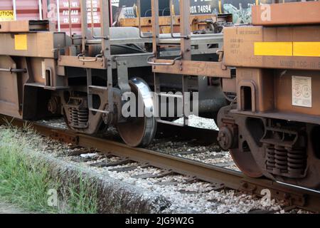 A closeup shot of rusty metal train tracks in White Rock, BC, Canada ...