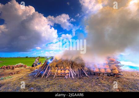 traditional pottery village, the handicraftsmen burn products, which ...