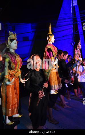 Thai professional puppeteer or Puppet master manipulate playing acting ...
