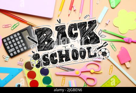 Poster with different stationery and text BACK TO SCHOOL on beige ...