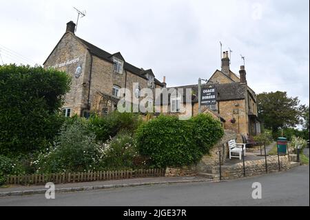 Coach and Horses pub in Longborough in the december snow. Longborough ...