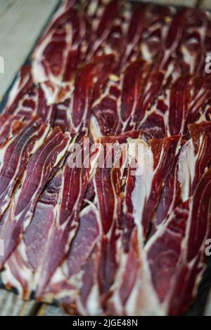 Spanish Iberian ham portion in a luxury European restaurant Stock Photo ...
