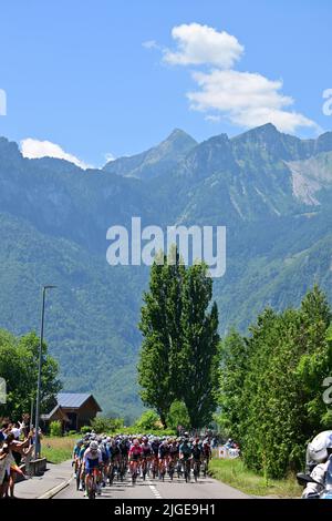 Chatel, France. 10th July, 2022. The pack of riders pictured in action ...