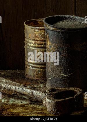 Creative still life with an old rusty wrench and a blue-white ...