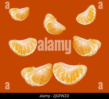 not peeled ripe orange cut into slices during cooking, ripe orange ...