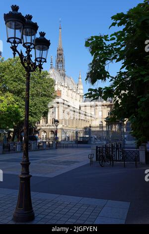 Spire of Saint-Chapelle -Holy Chapel with street lamp in foreground ...