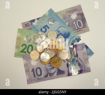 Canadian banknotes and coins, CAD, Canada, North America Stock Photo ...