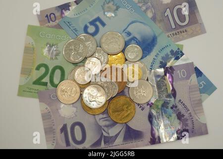 Canadian banknotes and coins, CAD, Canada, North America Stock Photo ...