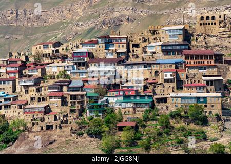 facades of houses located in tiers on a steep slope in the village of ...