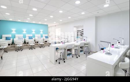 Nail salon bright interior, panorama of modern manicure shop. Inside ...