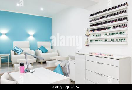 Nail salon bright interior, panorama of modern manicure shop. Inside ...