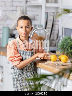 Happy afro family preparing dough together in kitchen Stock Photo - Alamy