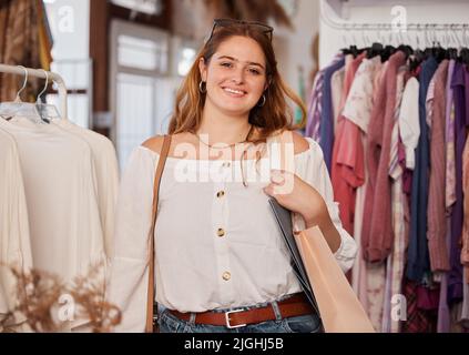 Its my favourite product. Cropped portrait of an attractive young woman ...