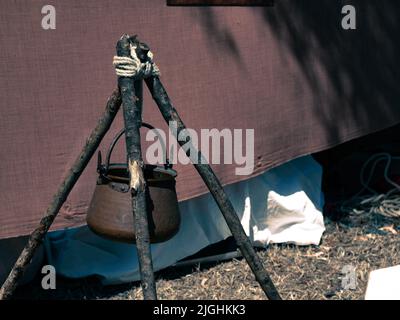 medieval reenactment, camp kitchen with cauldron, open steaming hot ...