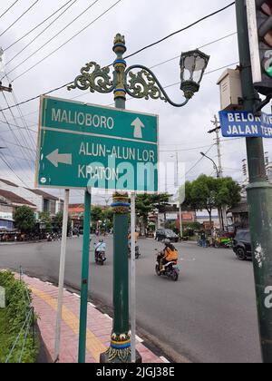 Street sign to Alun Alun LOR and Kraton, the Sultan palace and to the ...